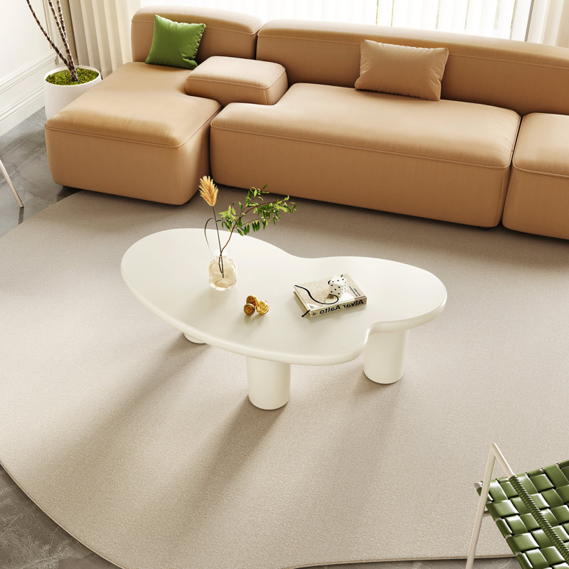 Ivy Bronx 46.45" Modern Center Table, Irregular Cream White Cloud Coffee Table with 3 Legs ...